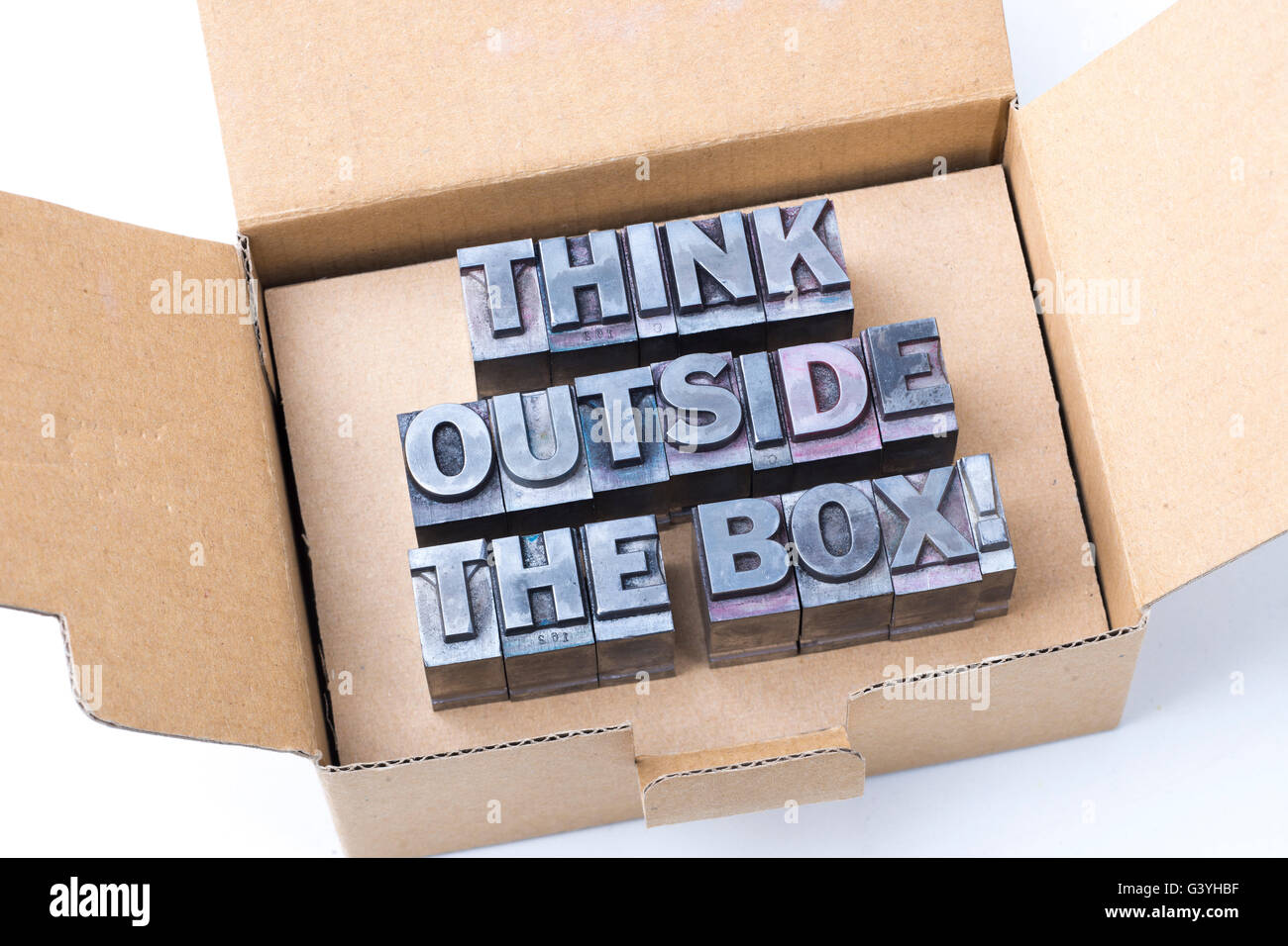 think outside the box phrase made from metallic font type in carton box ...