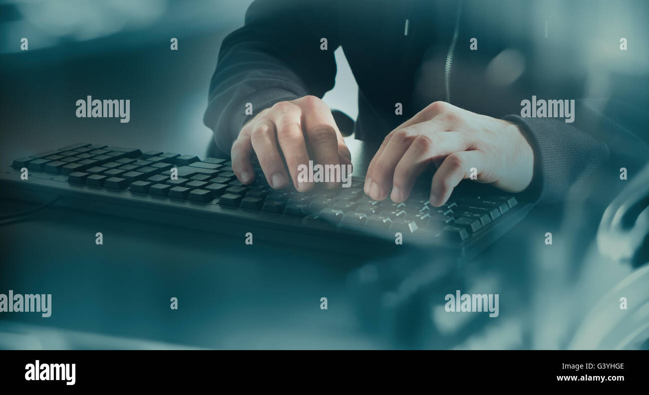 Computer hacker typing, cyber attack concept Stock Photo - Alamy