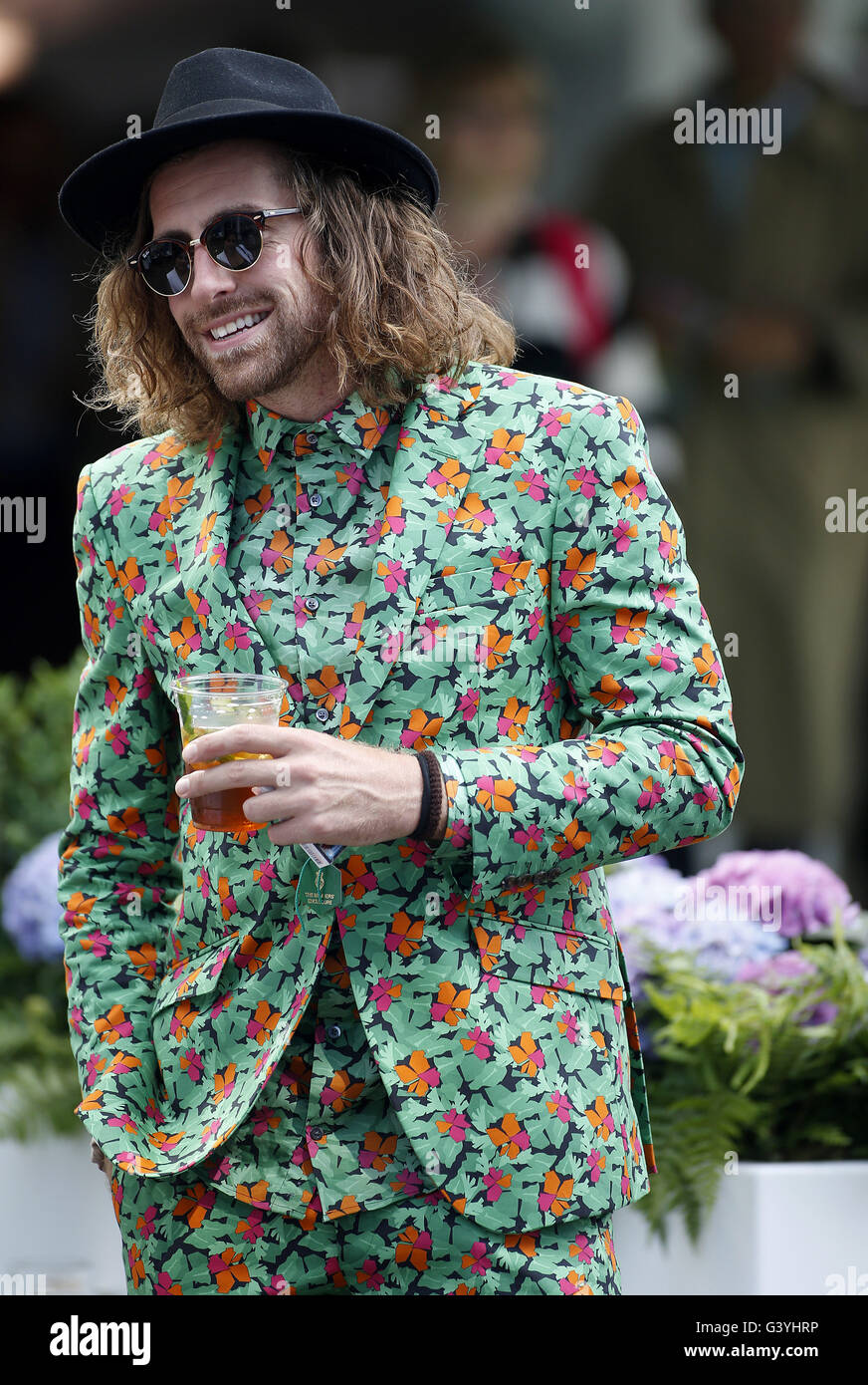 A general view of a spectator wearing a colourful suit during day four ...