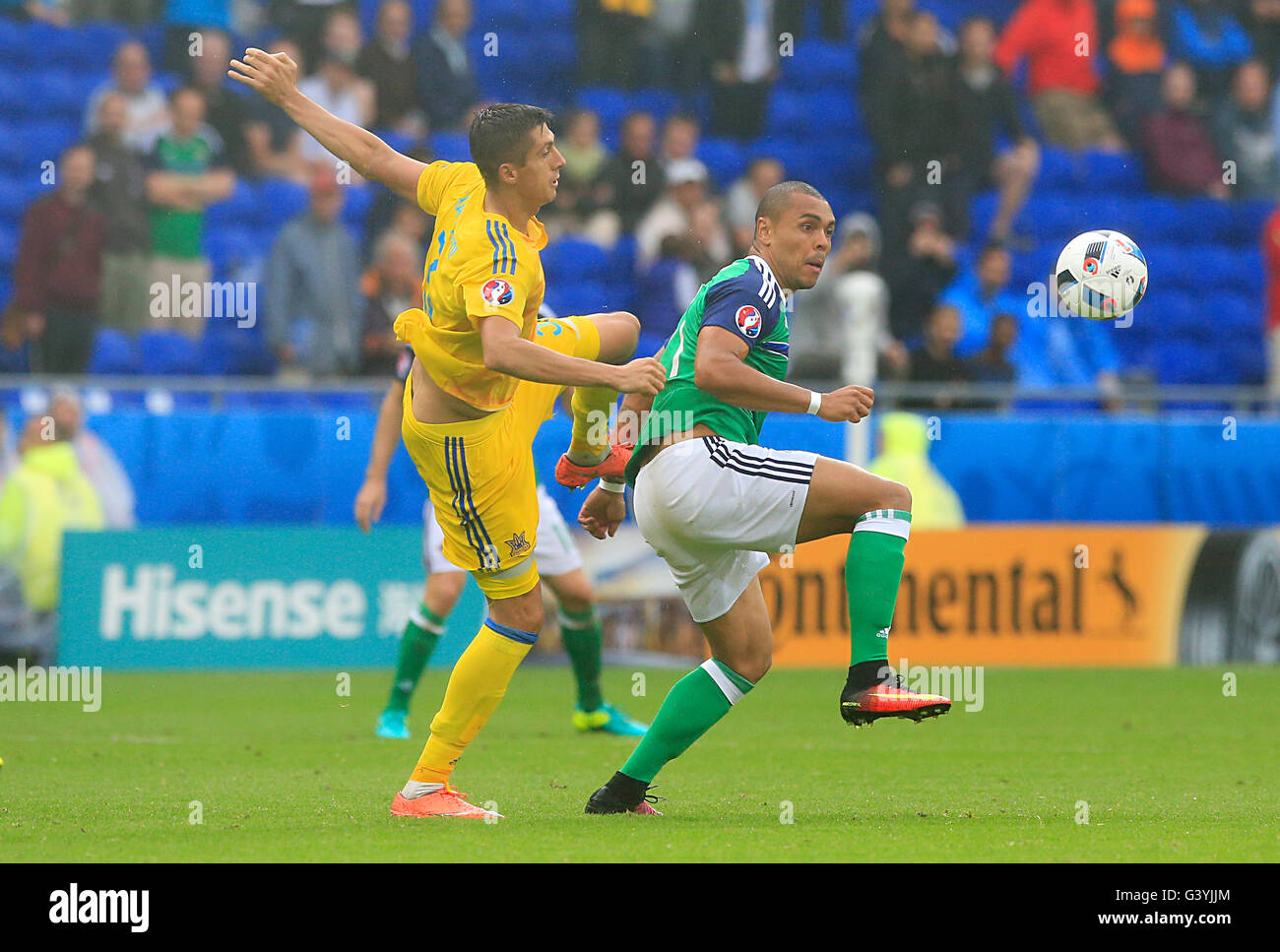 Ukraine's Yevhen Khacheridi (left) and Northern Ireland's Josh Magennis ...