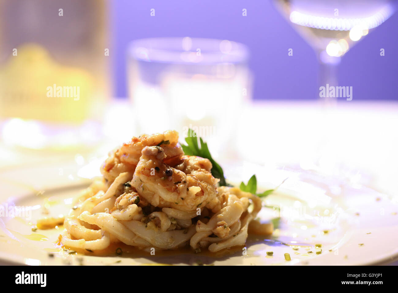 Italian pasta with fish in a dish Stock Photo - Alamy