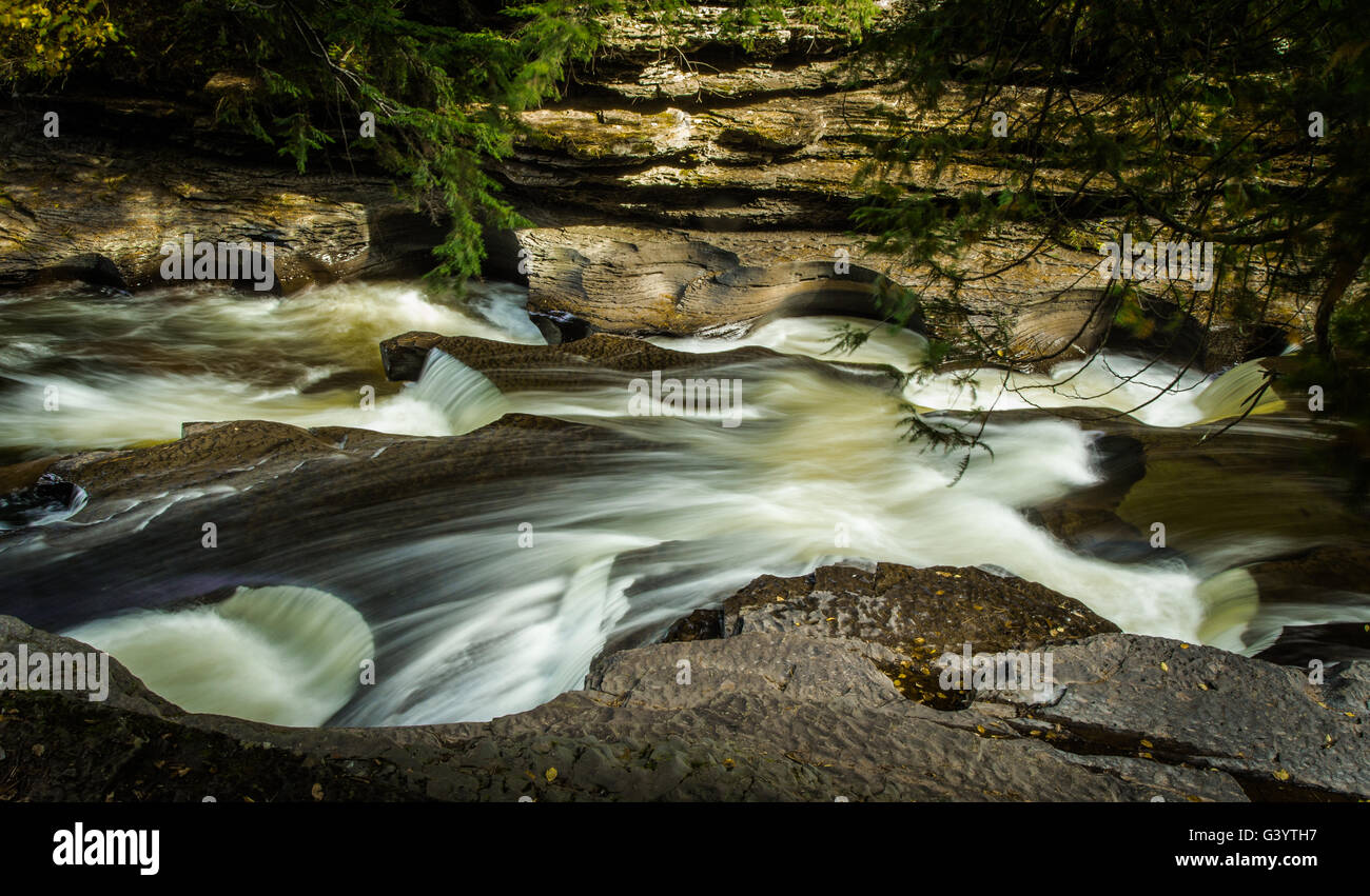 Porcupine Mountains State Park. The Presque Isle River carves it's way ...