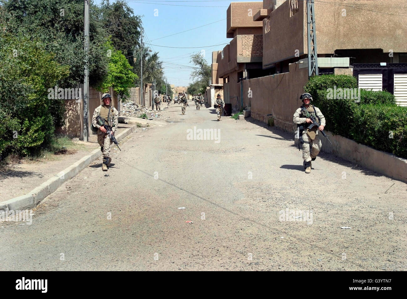 Marines patrol the streets of fallujah hi-res stock photography and ...