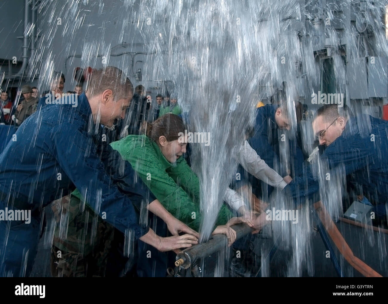 Sailors participate in a pipe patching exercise Stock Photo - Alamy