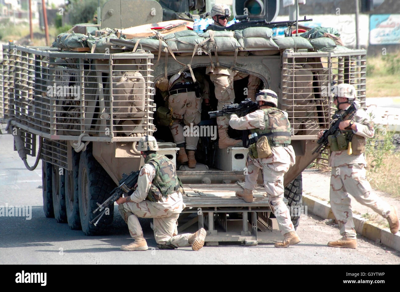 Soldiers load in to the Stryker Armored Personnel Carrier Stock Photo ...