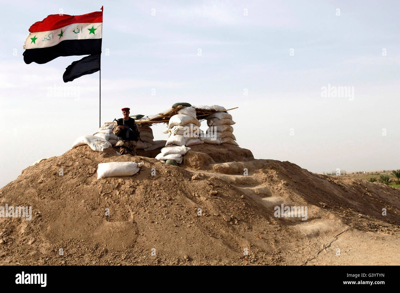 Army soldier watching watching standing sandbag hi-res stock ...