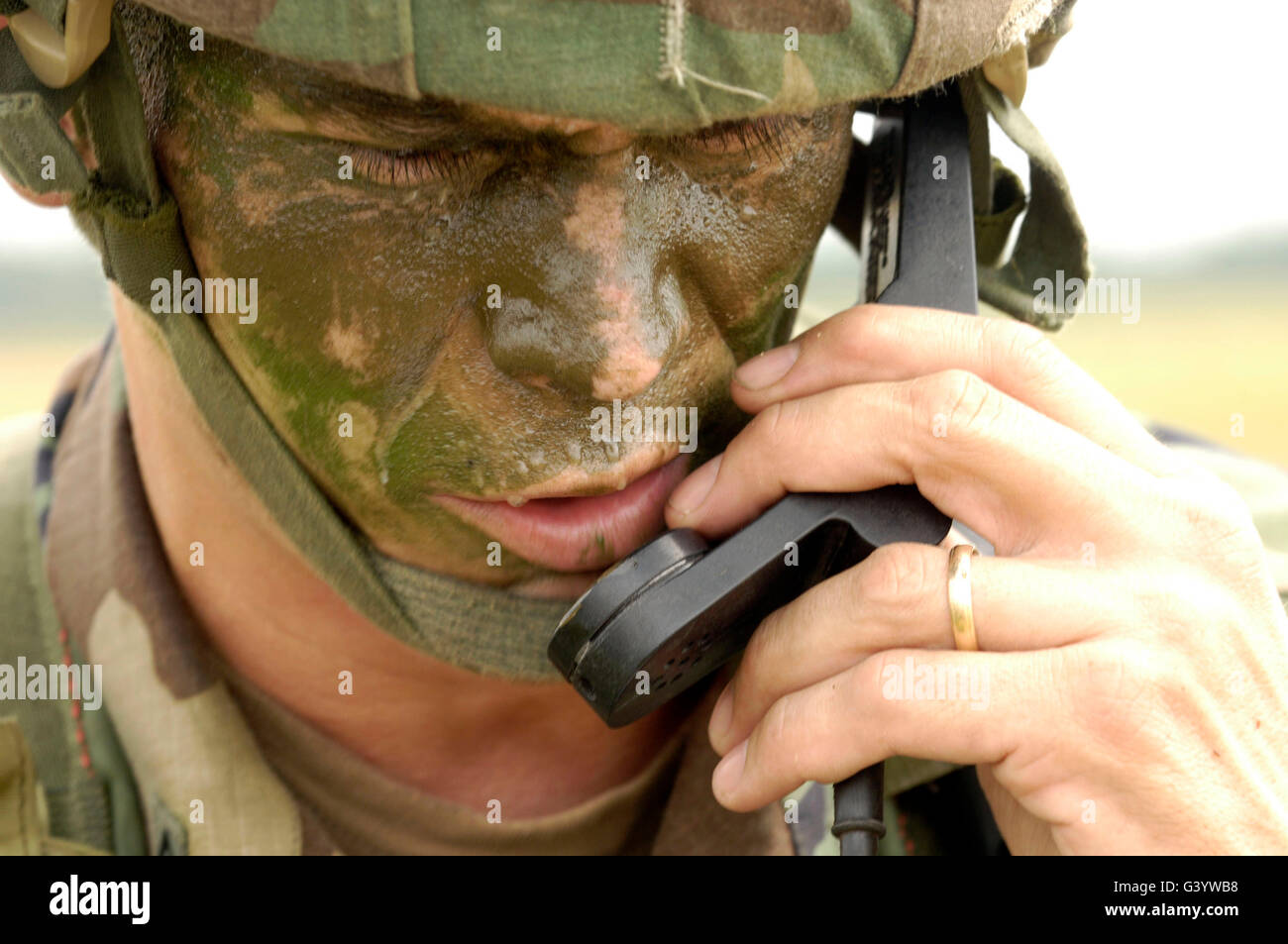 Army Master Sergeant communicates his location to higher headquarters ...
