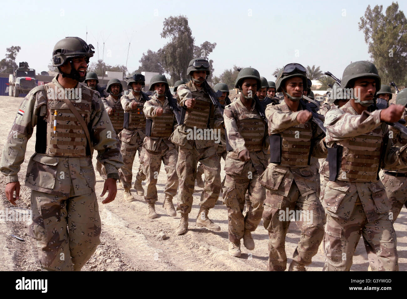 A soldier marches his troops around a compound Stock Photo - Alamy