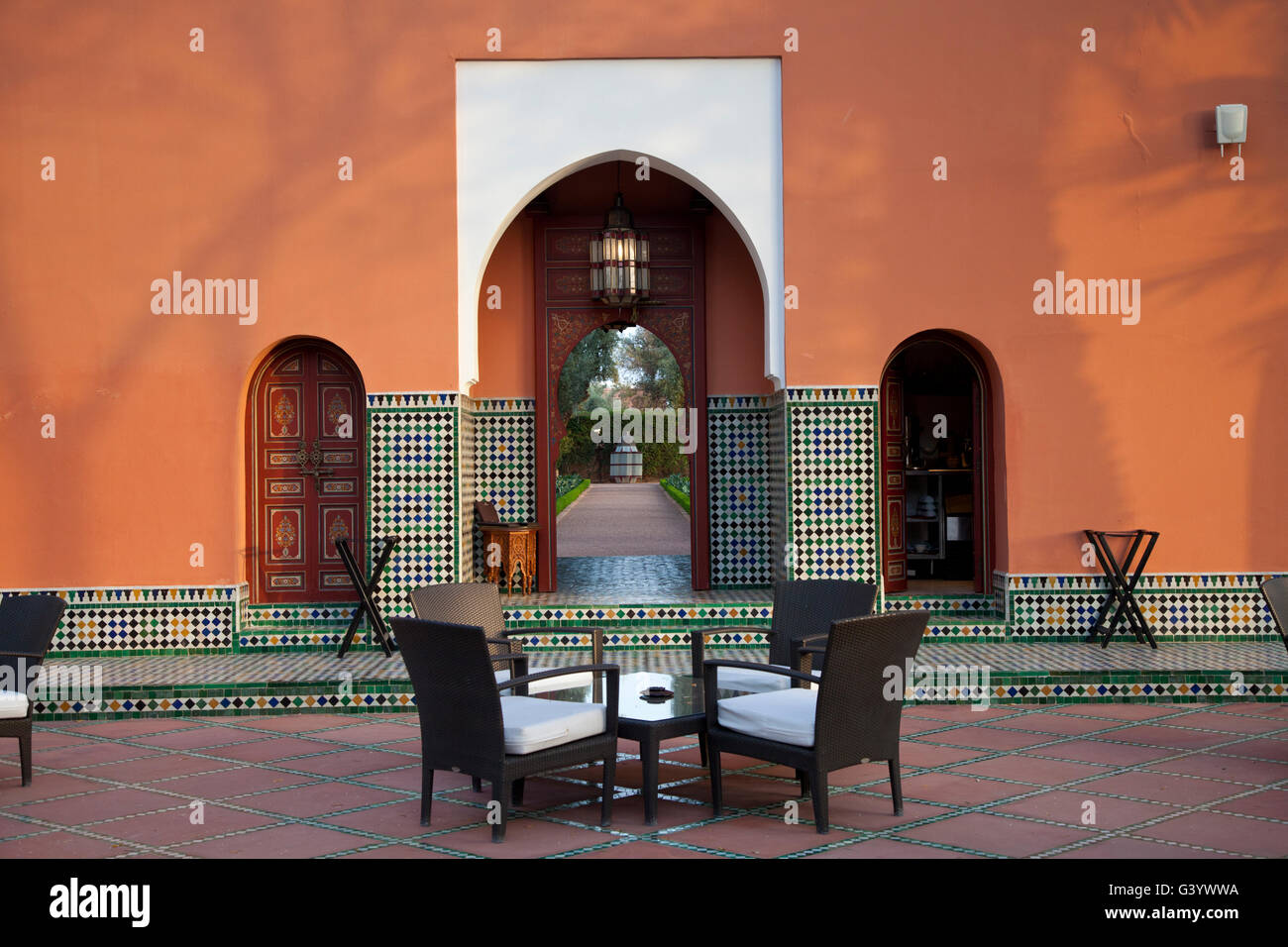 Arch hotel morocco table interior luxury tile food riad hi-res stock ...