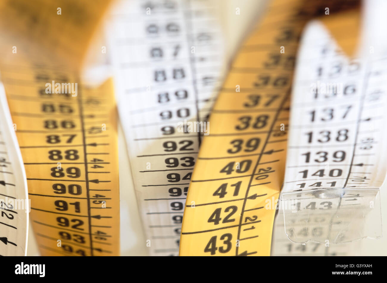 Tape-measure with reapeated numbers. Abstract background Stock Photo ...