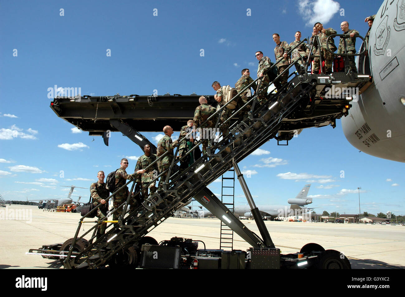 Airmen use the aircraft stairs portion of the Halvorson Air Stairs Kit ...