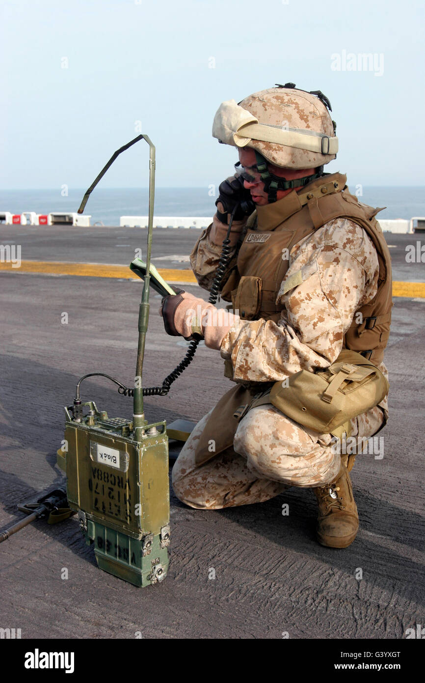 A U.S. Marine calls in a simulated casualty report Stock Photo - Alamy