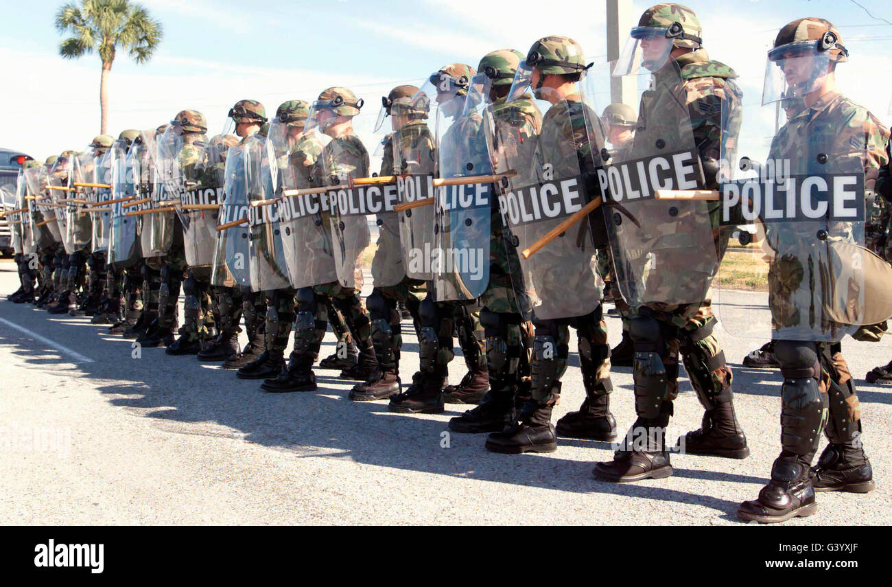 Members of the Security Forces Squadron participate in riot control ...
