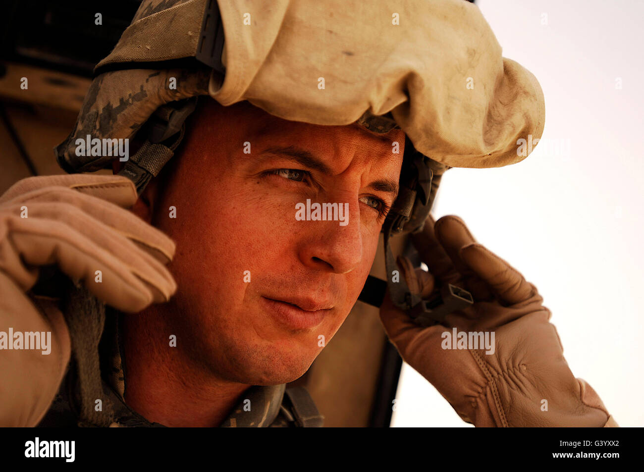 A convoy commander gears up before leading a convoy Stock Photo - Alamy