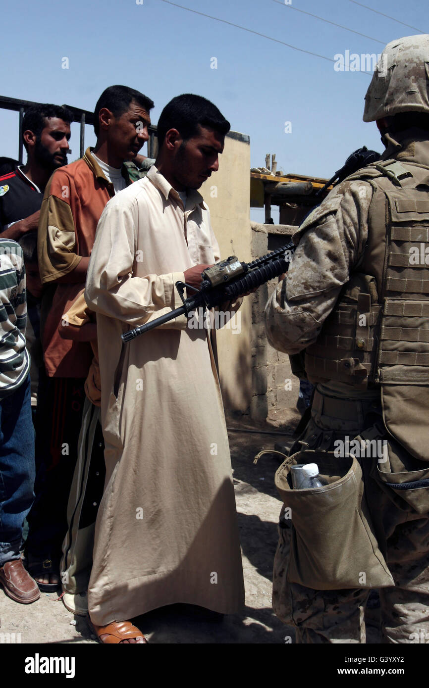Policeman checking identification hi-res stock photography and images ...