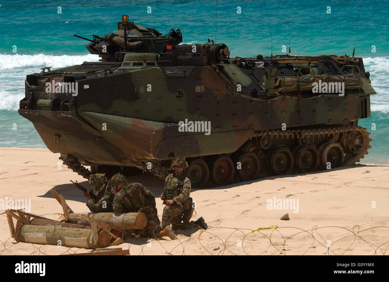 U.S. Marines guard their Amphibious Assault Vehicle on the Hawaiian ...
