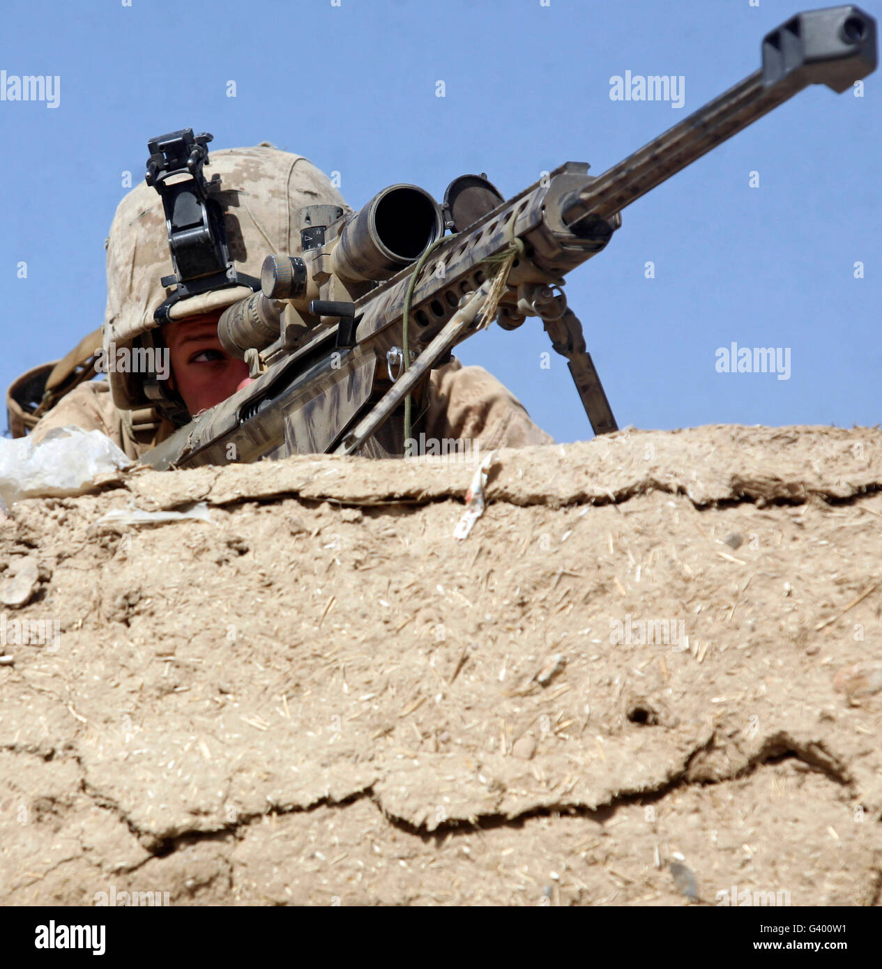 U.S. Marine scout sniper provides security inside a compound in Marjah ...