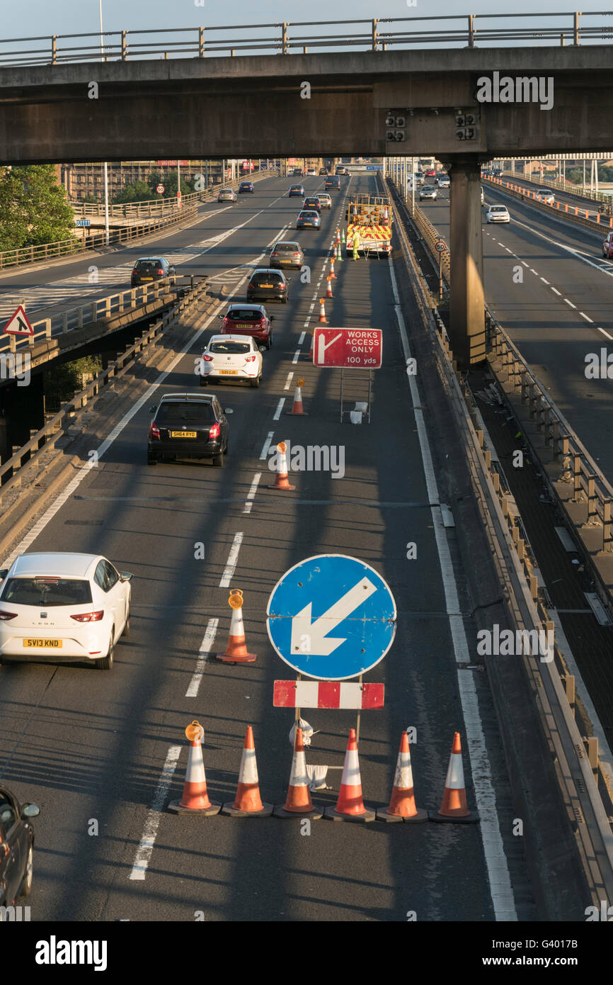 Traffic cones,lane closure and road signs on urban motorway,Glasgow ...