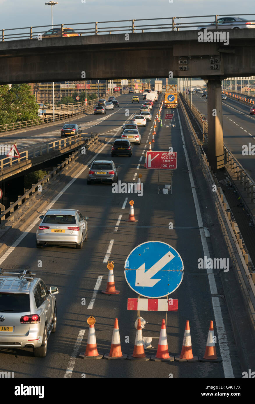 Traffic cones and road signs for lane closure on urban motorway,Glasgow ...