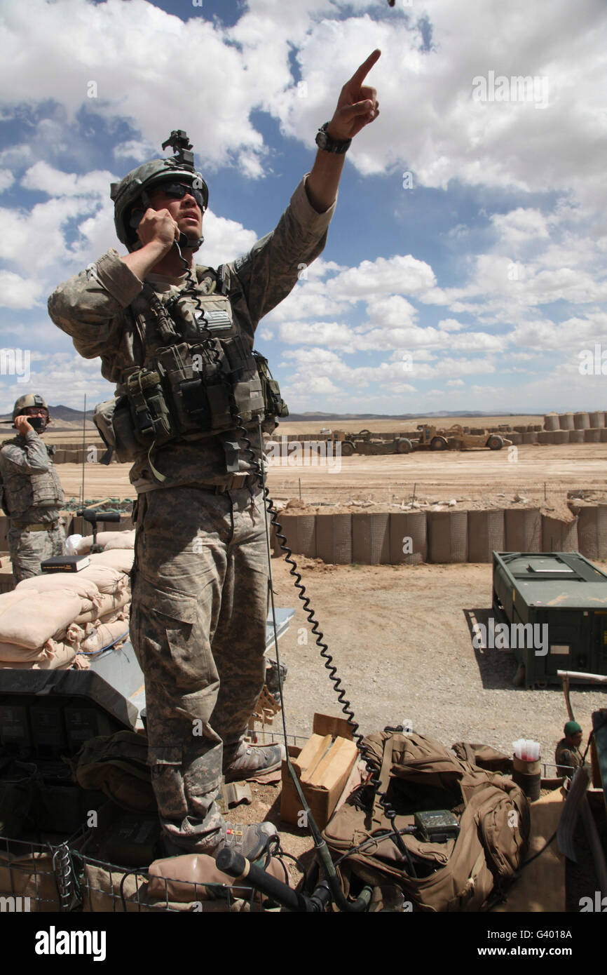 U.S. Air force member calls for air support at Combat Outpost Jaghato ...