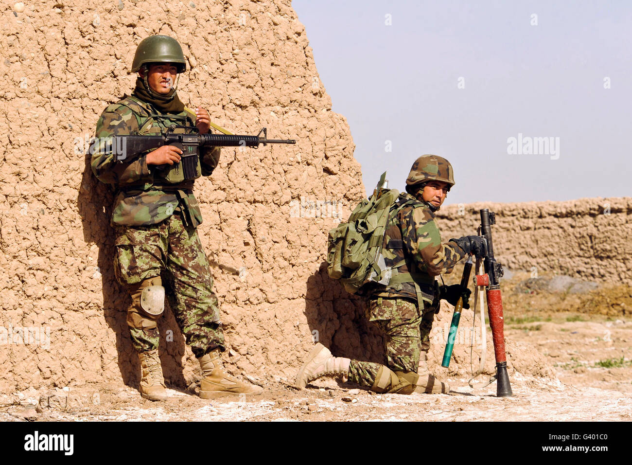 Afghan soldiers conduct a dismounted patrol in Afghanistan Stock Photo ...