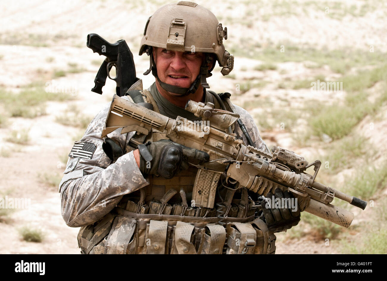 A U.S. Army soldier secures the perimeter of a village in Afghanistan ...