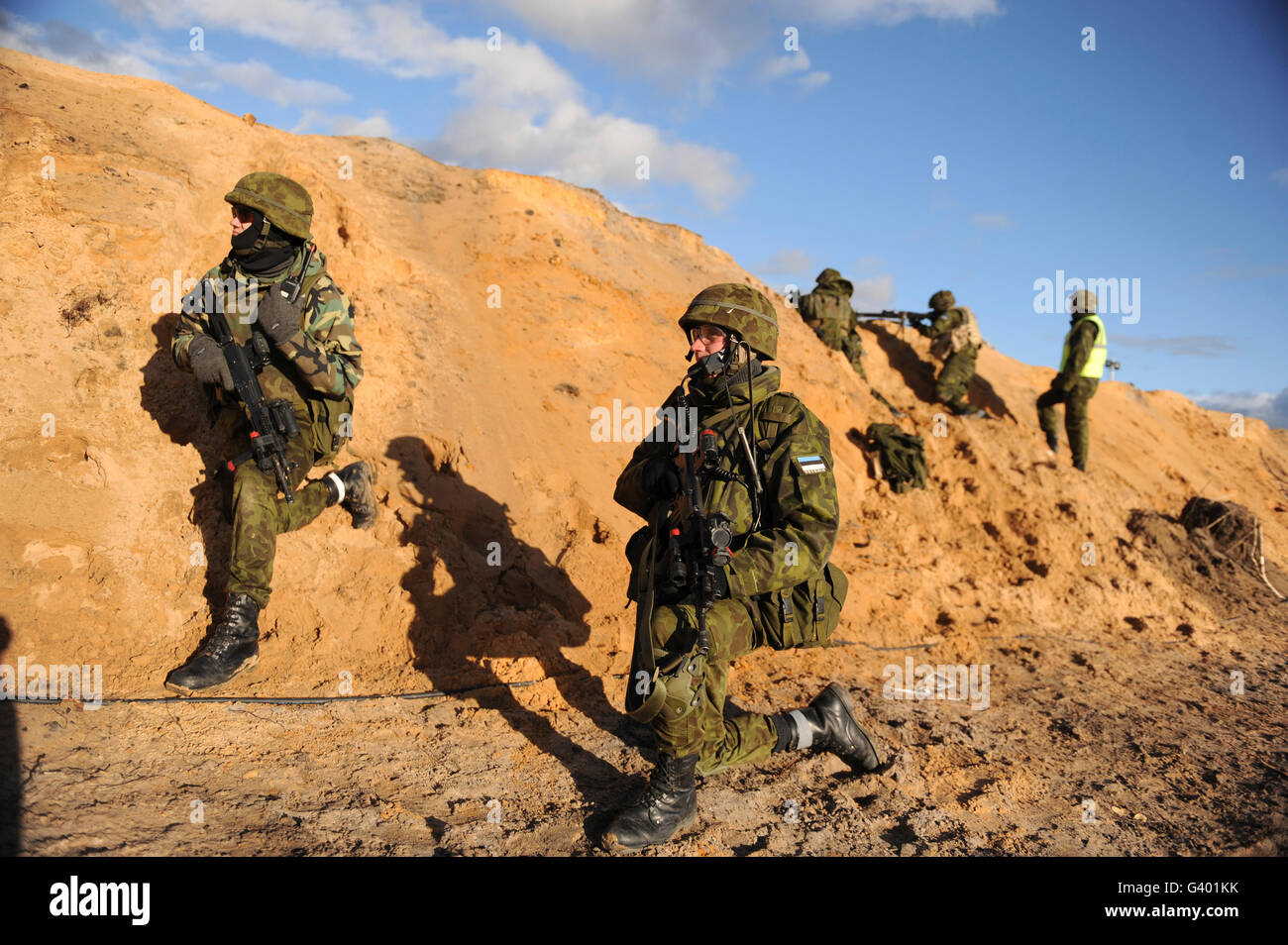 Latvian soldiers train at an Estonian checkpoint in Adazi Training Area ...