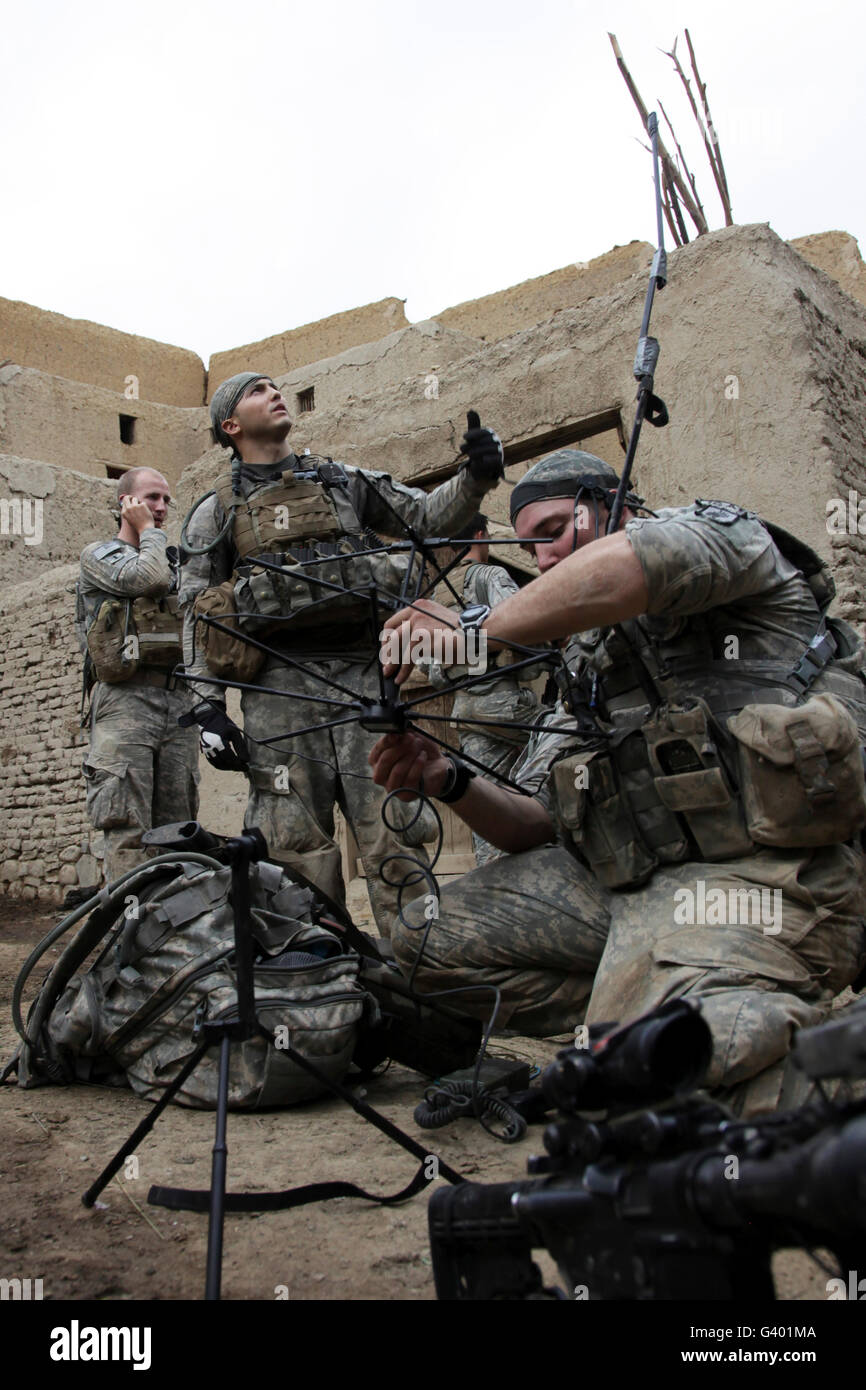 U.S. Soldiers set up a tactical satellite communication system in ...
