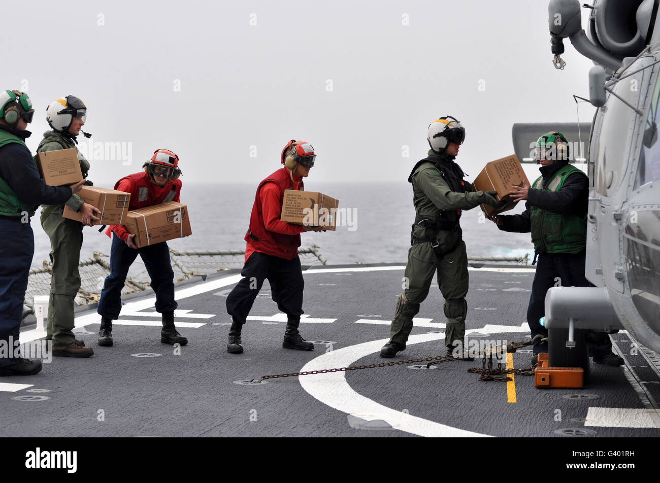 Us military personnel load boxes hi-res stock photography and images ...