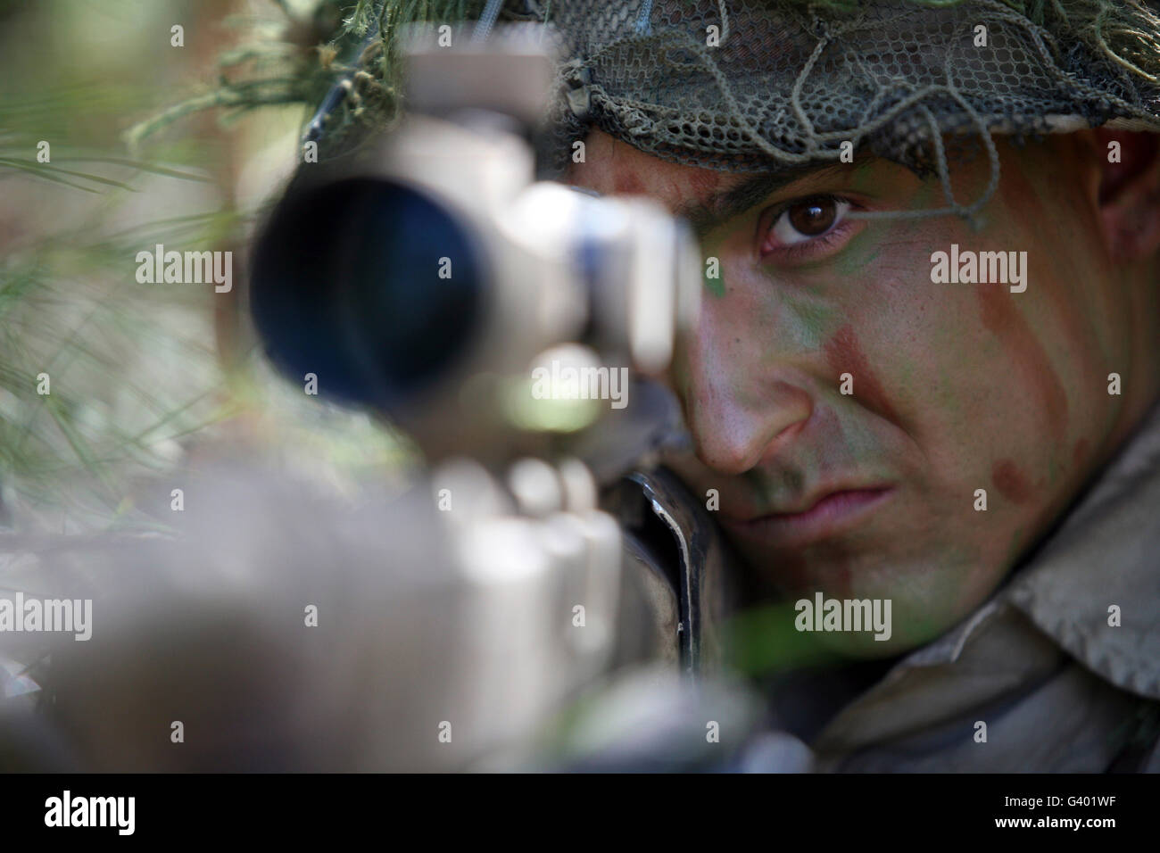 A sniper sights in on a target Stock Photo - Alamy