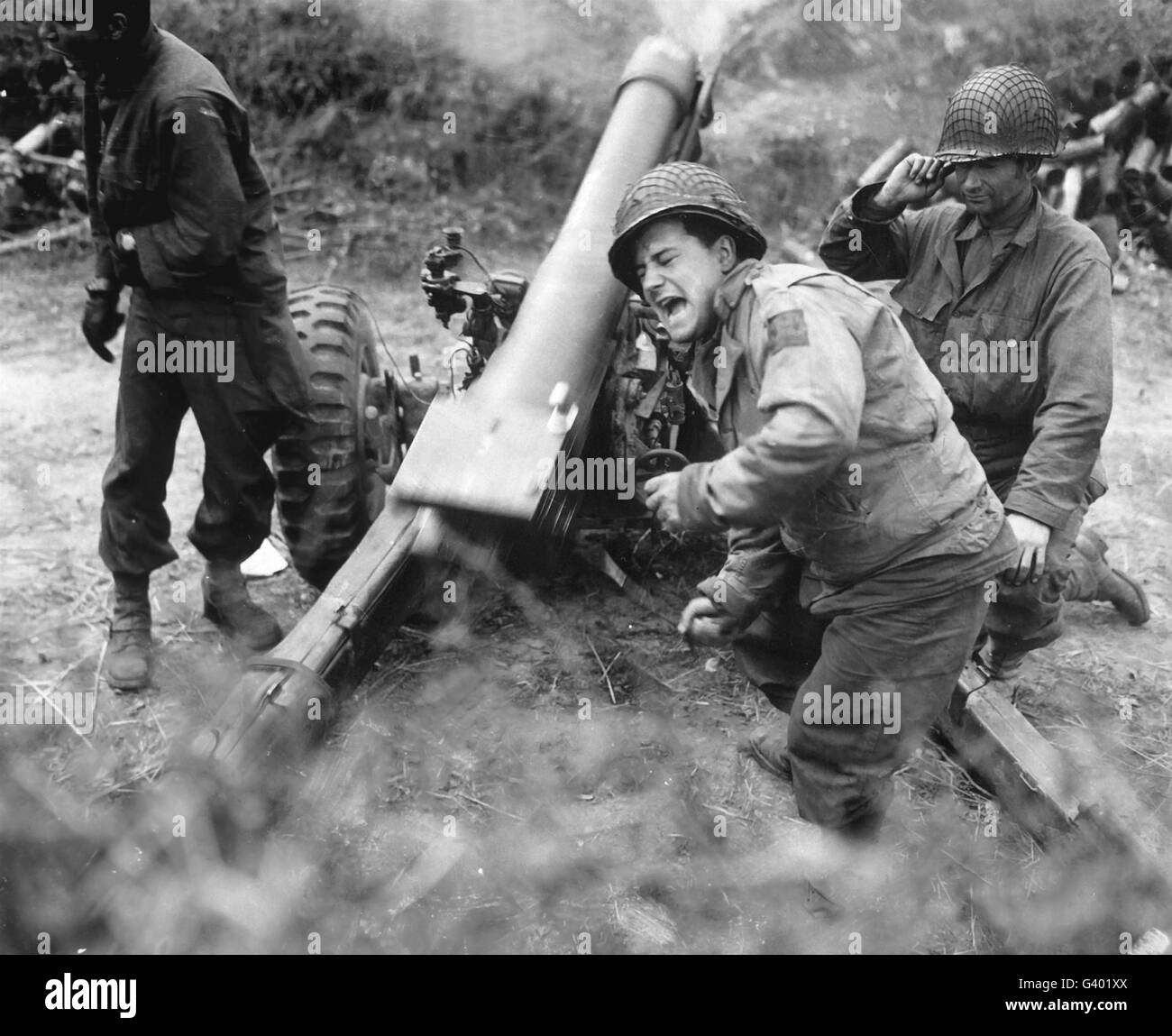American howitzers shell German forces retreating near Carentan, France ...