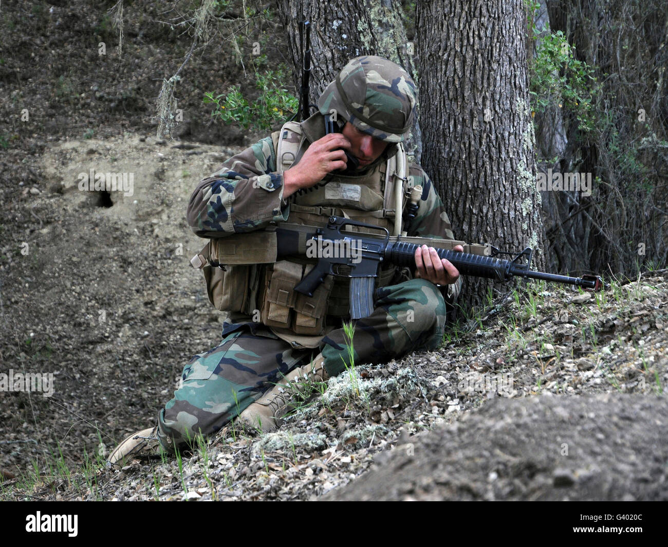 Soldier leaning on rifle hi-res stock photography and images - Alamy