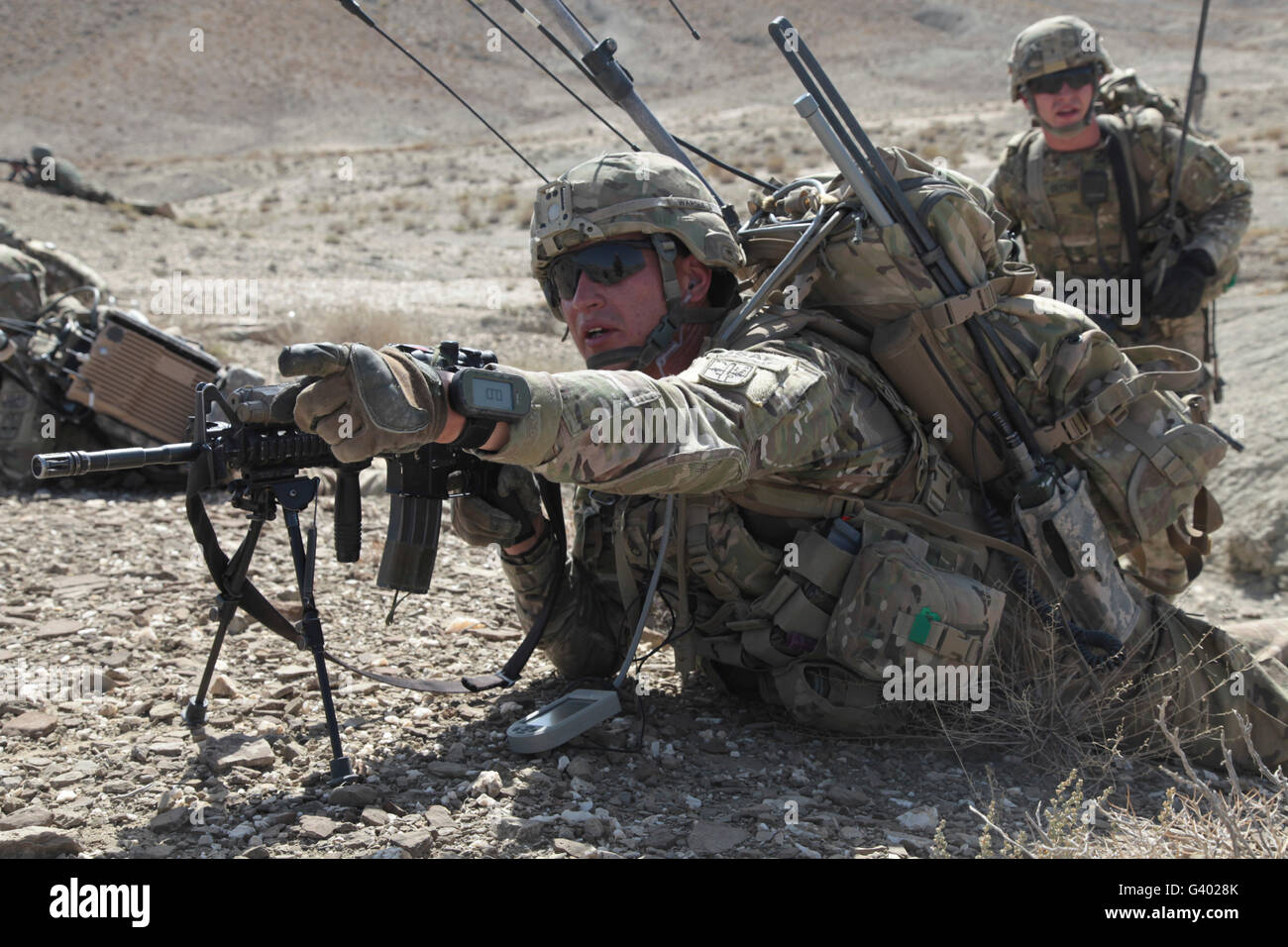 U.S. Army soldiers provide security during a dismounted patrol in ...