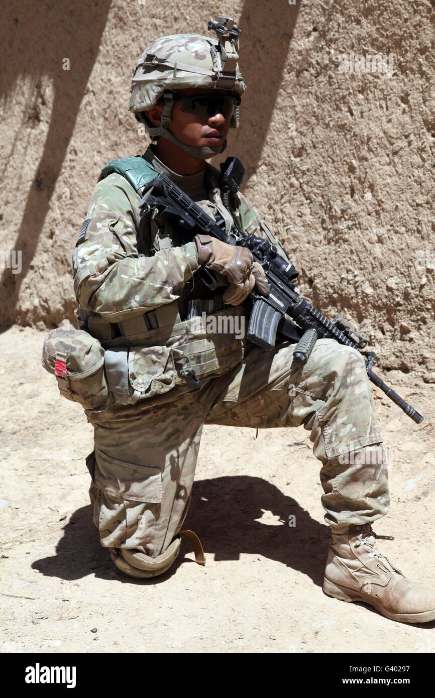 U.S. Army soldier takes a knee while providing security in Afghanistan ...