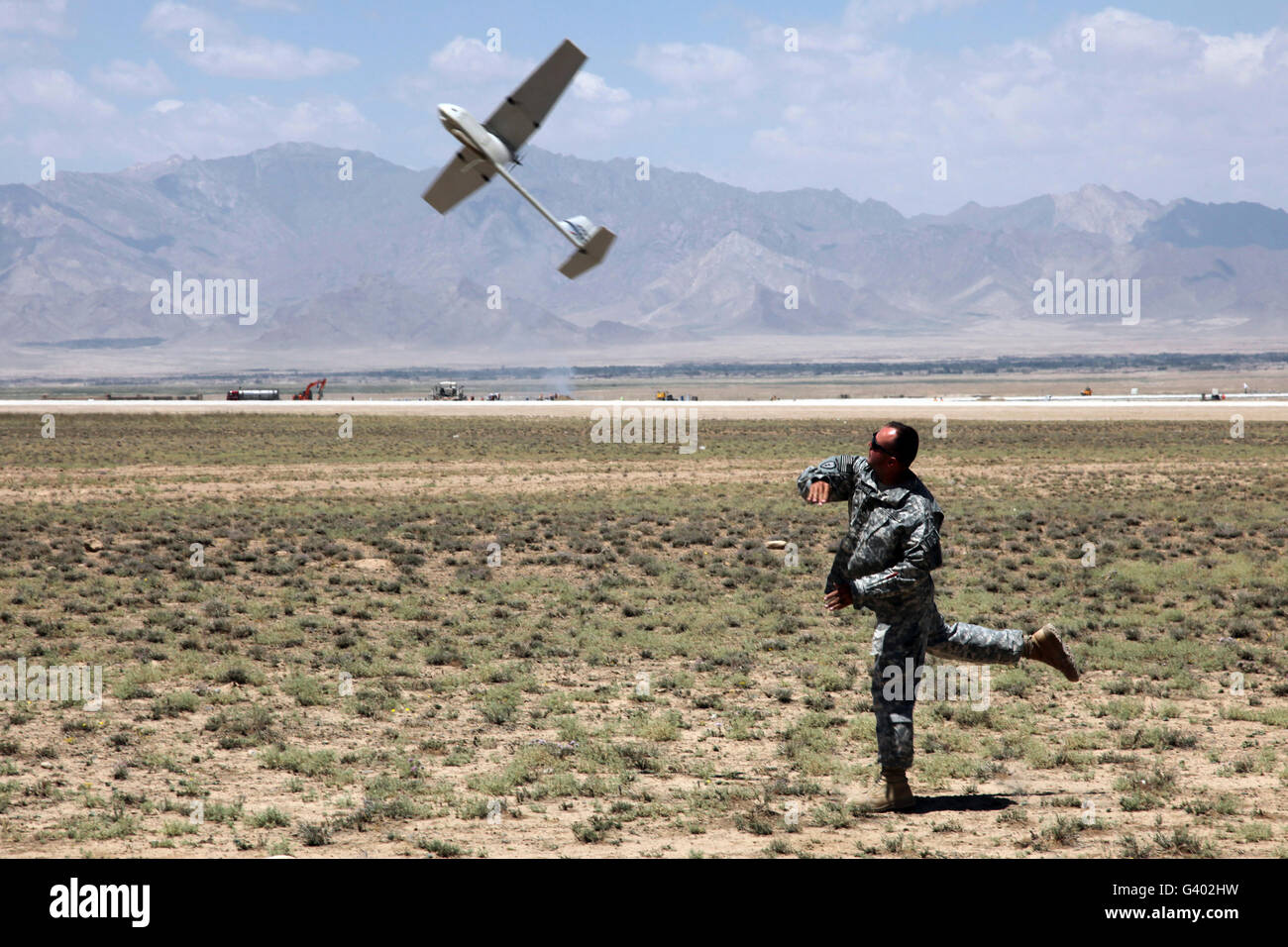 U.S. Army soldier launches an RQ-11 Raven unmanned aerial vehicle Stock ...
