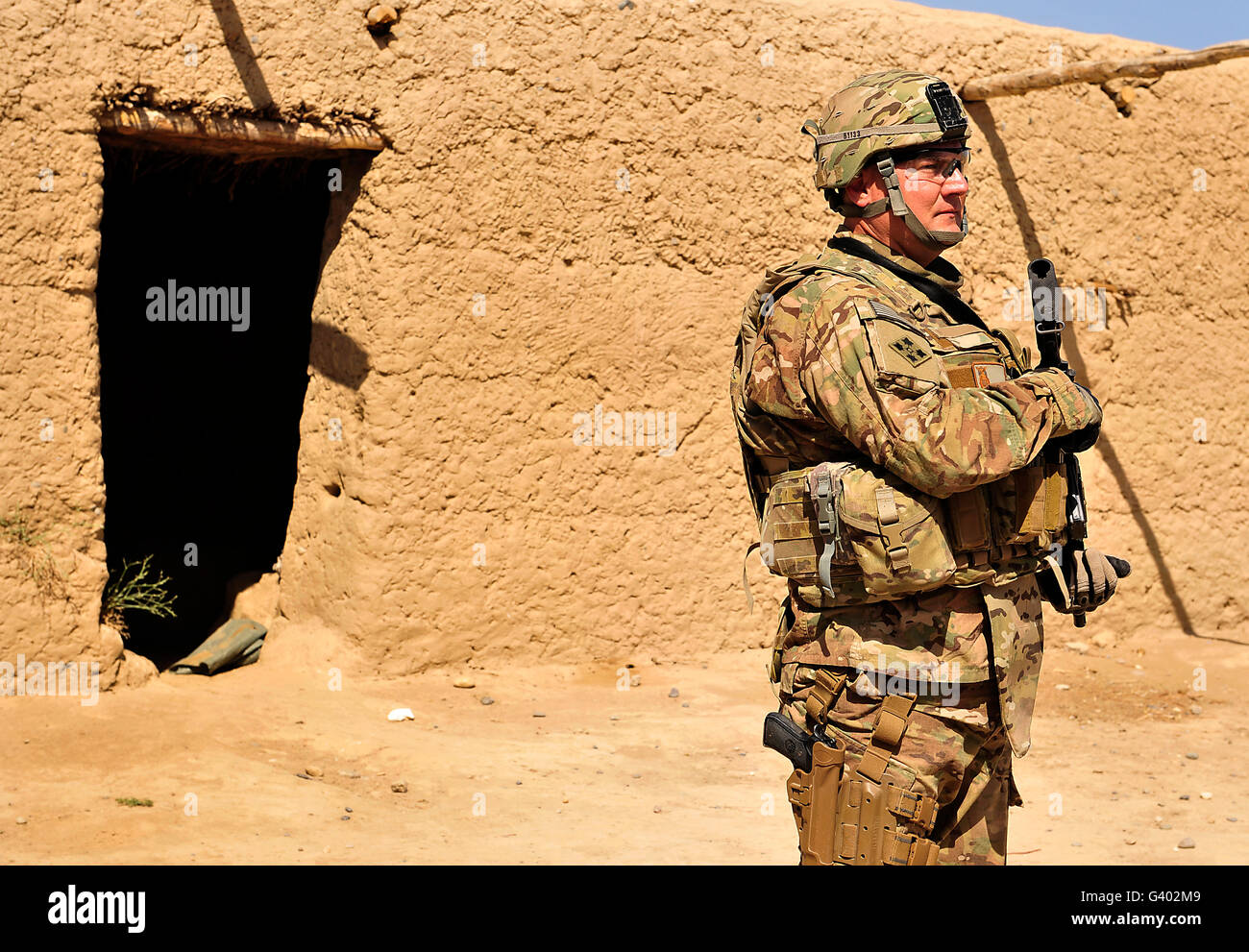 Soldier stands guard during a routine mission in Kajaki, Afghanistan ...