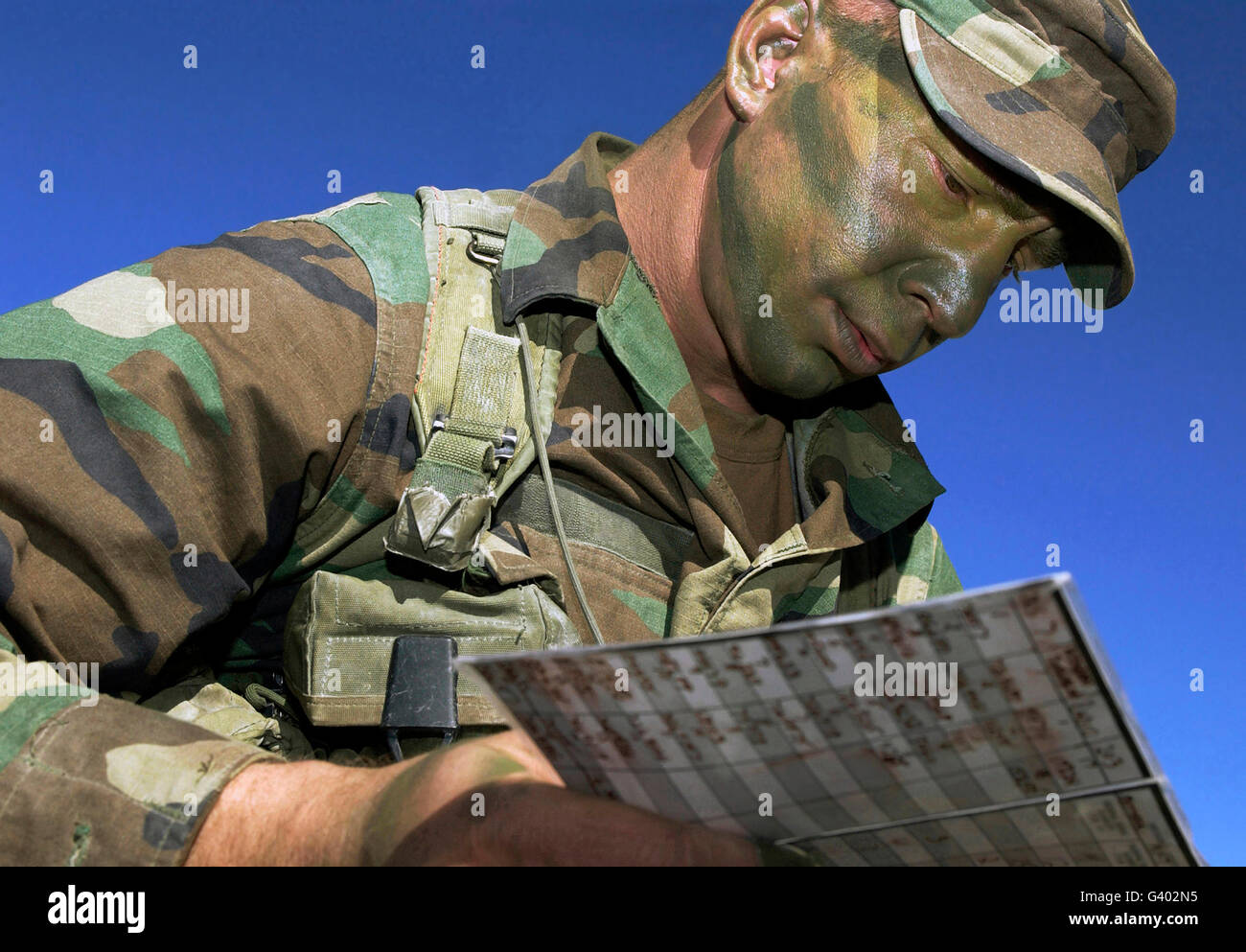 U.S. Air Force Lieutenant reviews the equipment accountability log ...