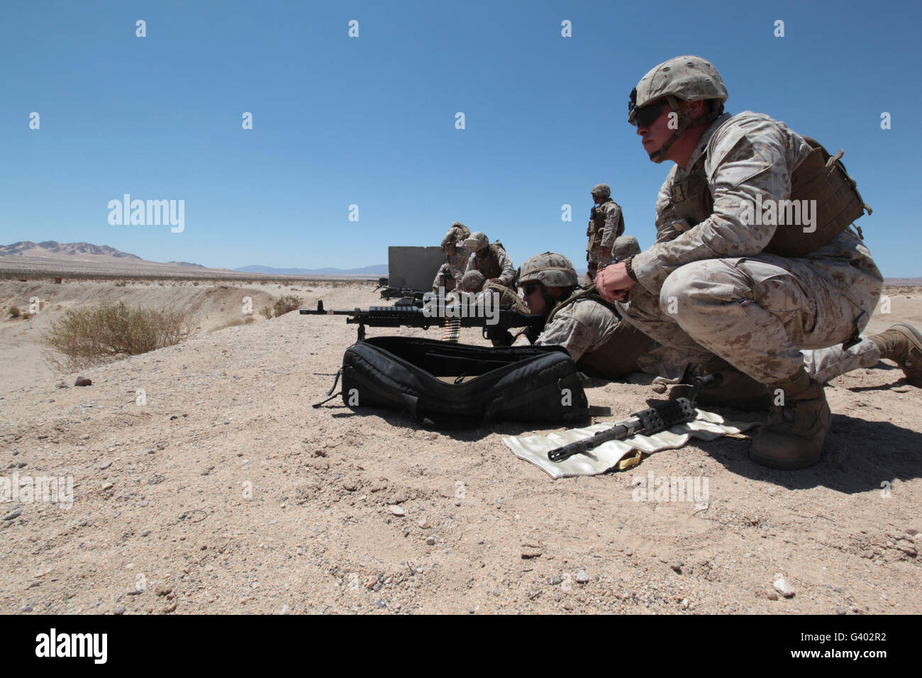 Marines firing the M240G machine gun at a shooting range Stock Photo ...
