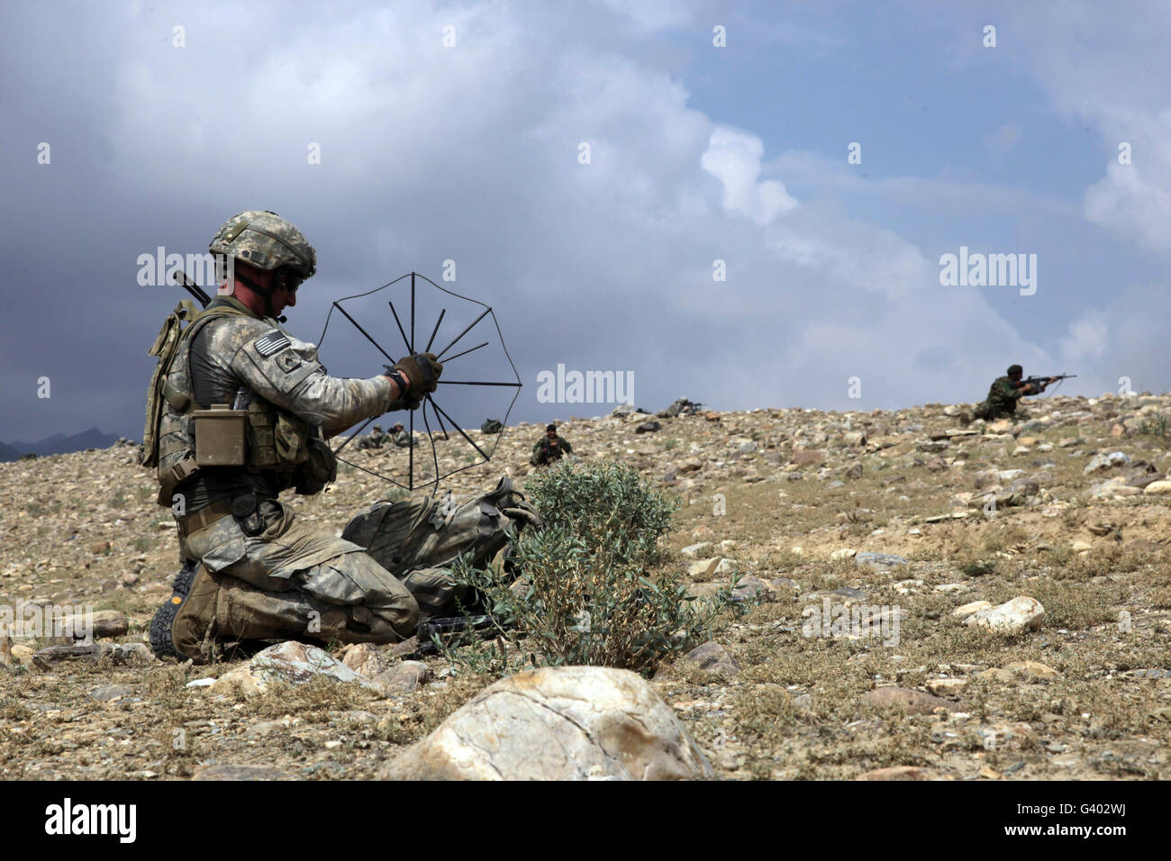 A U.S. Soldier sets up a tactical satellite communication system Stock ...