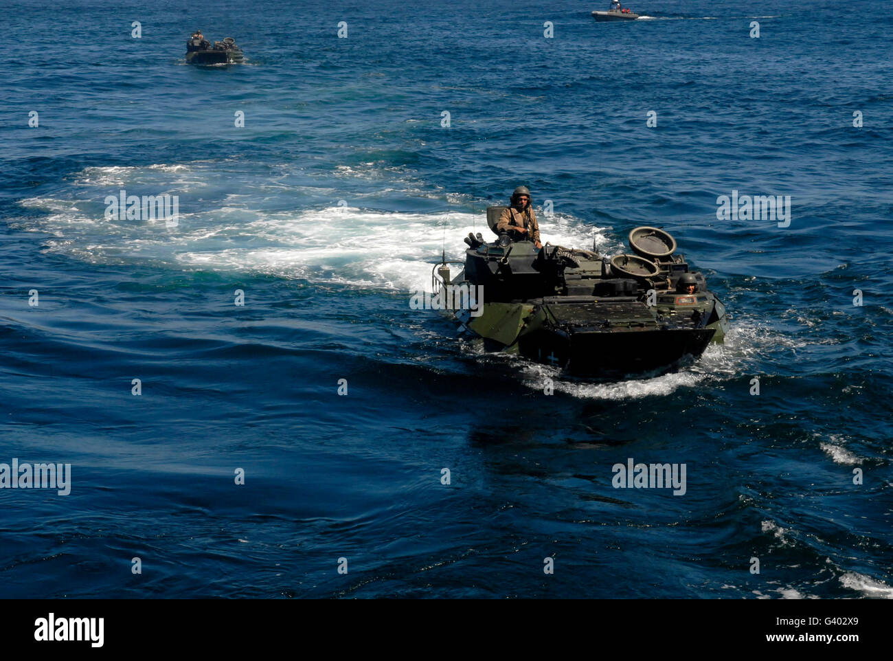 Amphibious assault vehicles transit the Pacific Ocean Stock Photo - Alamy