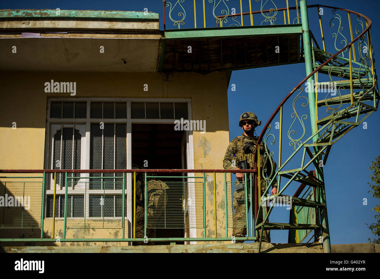 U.S. Air Force Staff Sergeant provides overwatch security Stock Photo ...