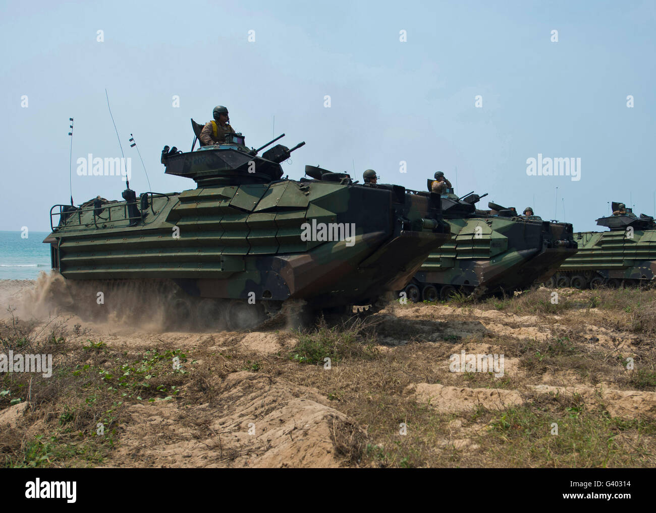 Amphibious assault vehicles line up on the beach in Hat Yao, Thailand ...