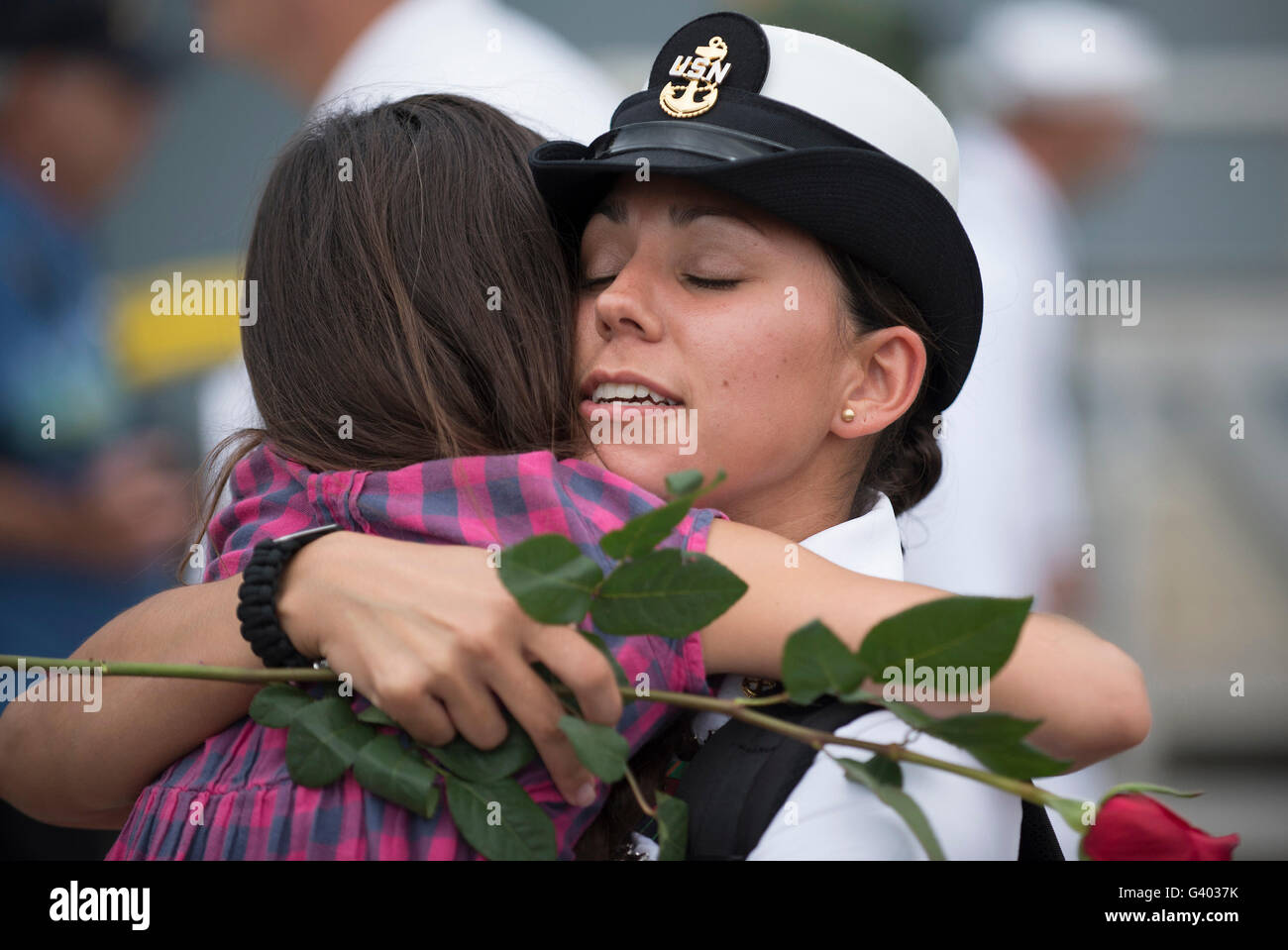 Sailor hugs her daughter after returning from deployment Stock Photo ...