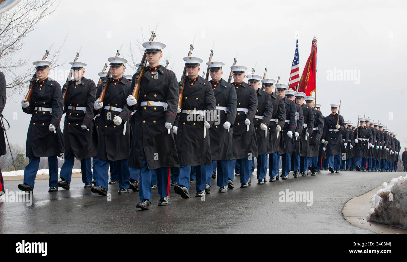 U.S. Marines participate in a funeral service at Arlington National ...