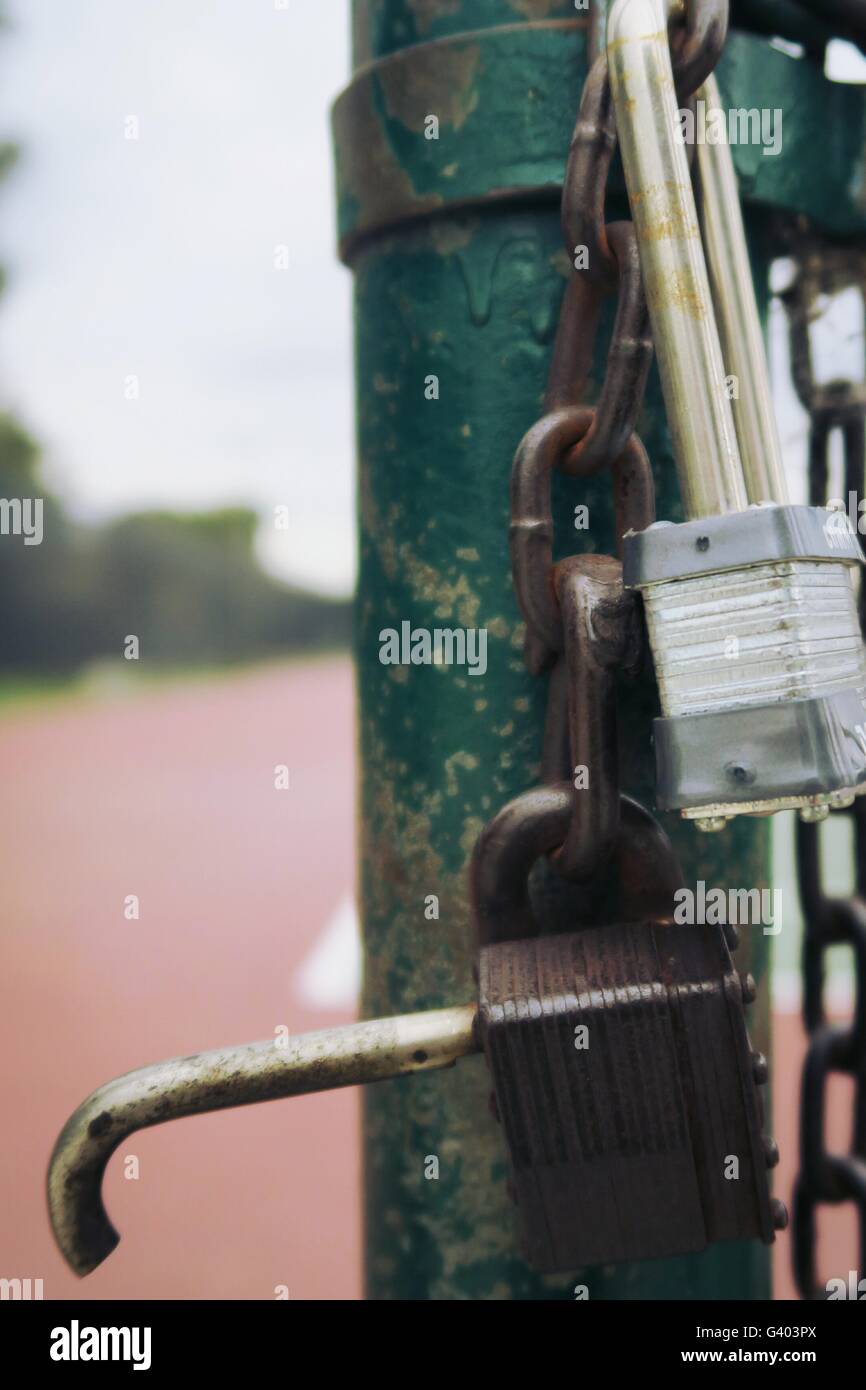 Broken gate chain hi-res stock photography and images - Alamy