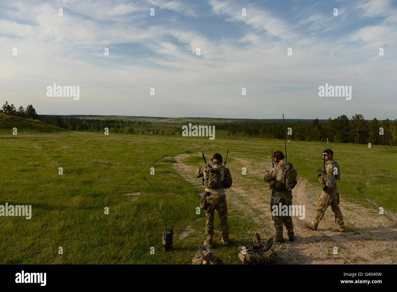 U.S. Air Force combat controllers prepare the range for a live-fire ...