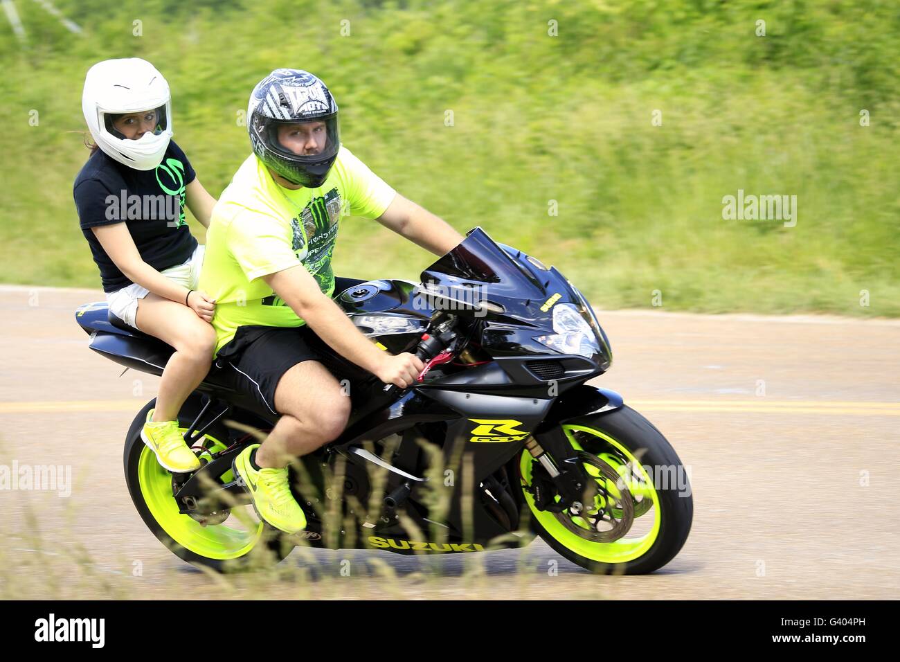 Woman riding a motorcycle hi-res stock photography and images - Alamy