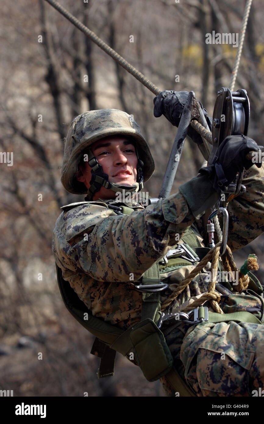 A rifleman slides down a zip line Stock Photo - Alamy