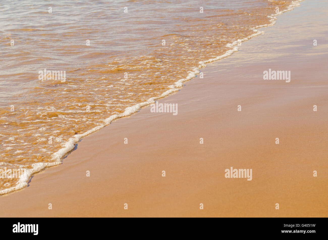 Soft ocean wave on the sandy beach, shallow depth of field Stock Photo ...