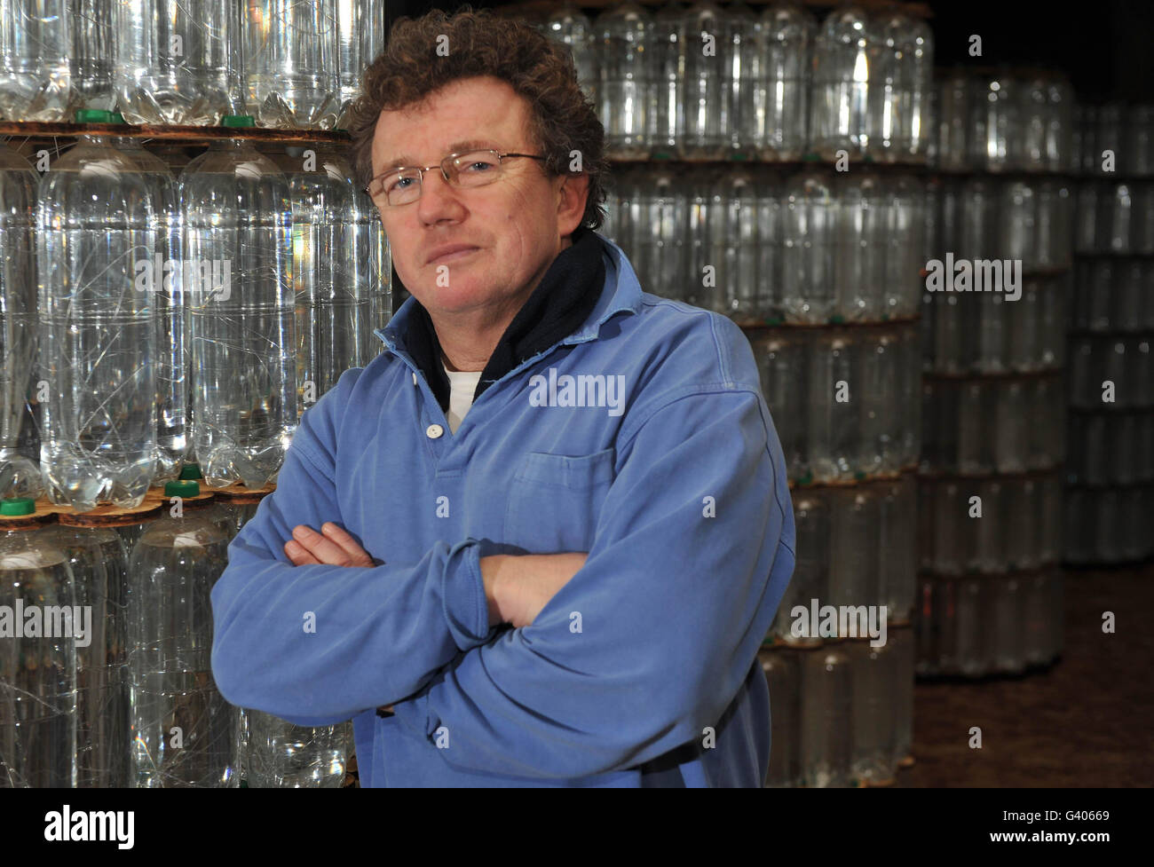 Artist Bruce Munro stands with his piece Water-Towers, his new ...